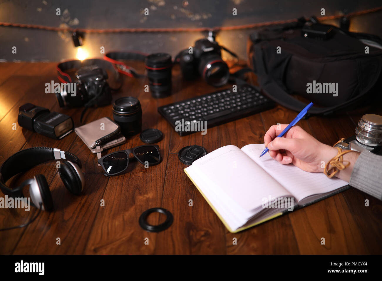 Desk photographer laptop cameras hi-res stock photography and images ...