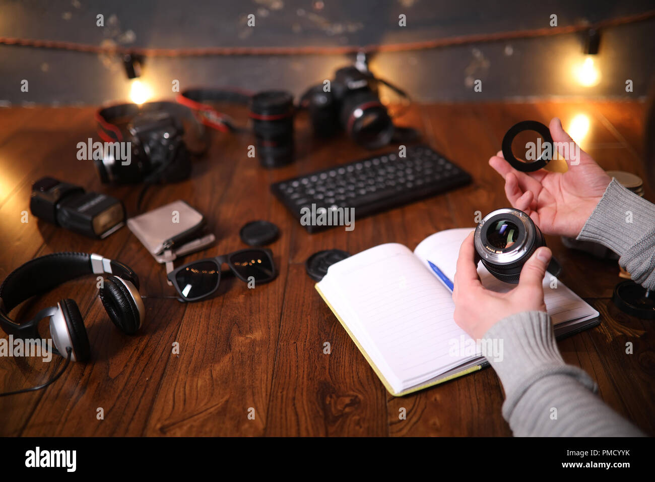 Desk photographer laptop cameras hi-res stock photography and images ...