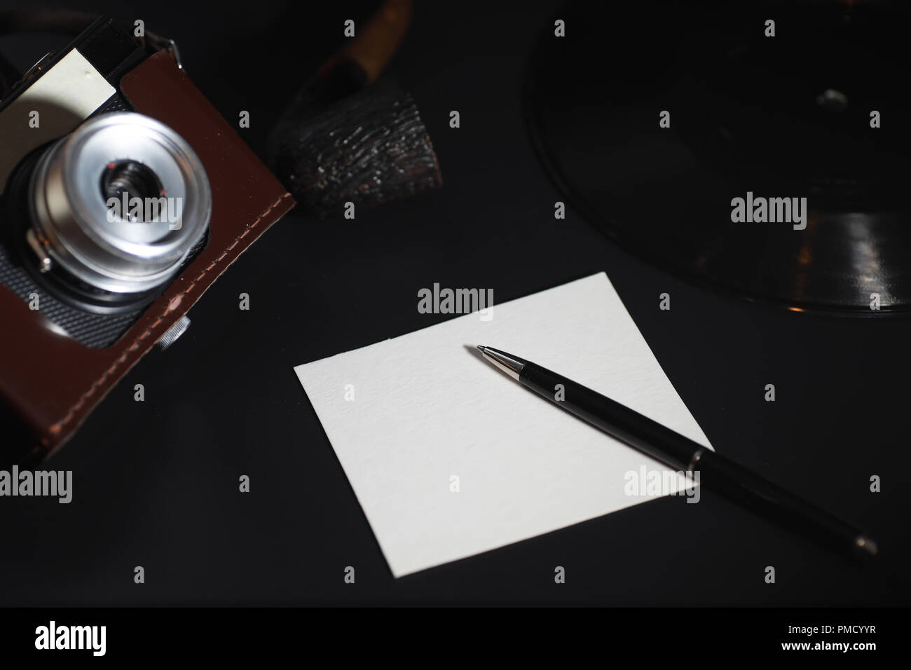 Vinyl plate and retro camera Stock Photo - Alamy