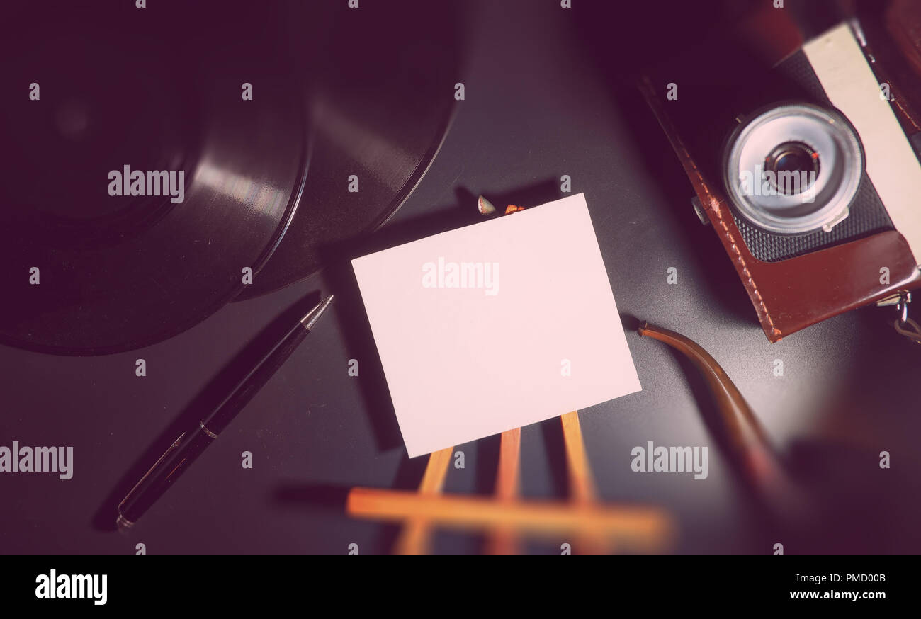 Vinyl plate and retro camera Stock Photo - Alamy