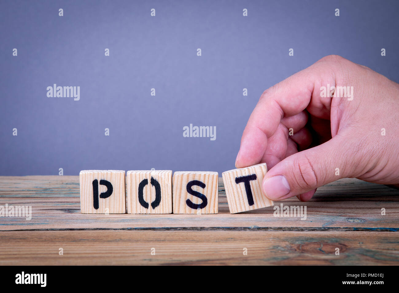 post. Wooden letters on the office desk Stock Photo - Alamy