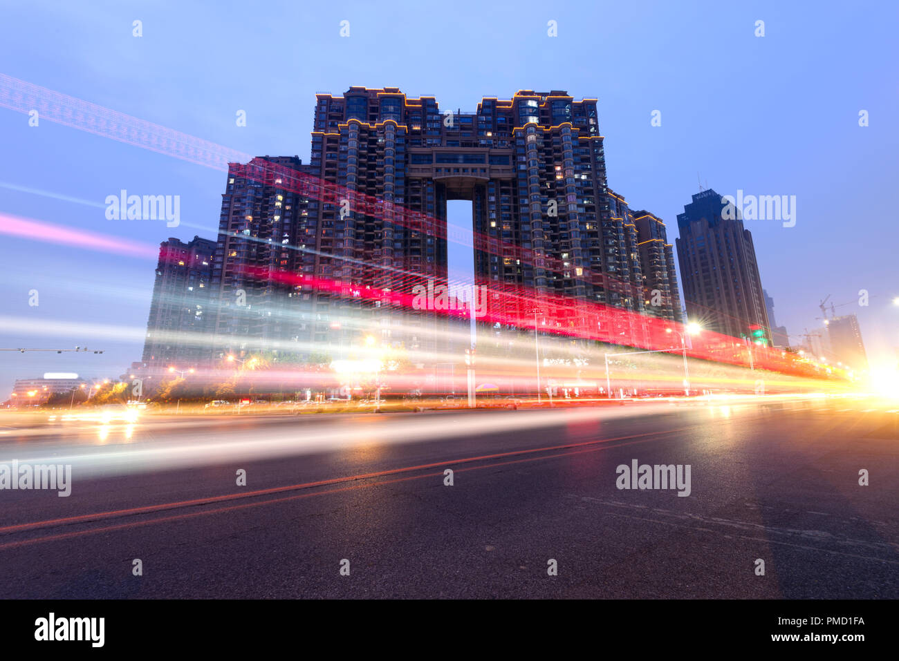 The light trails on the modern building background in shanghai china ...