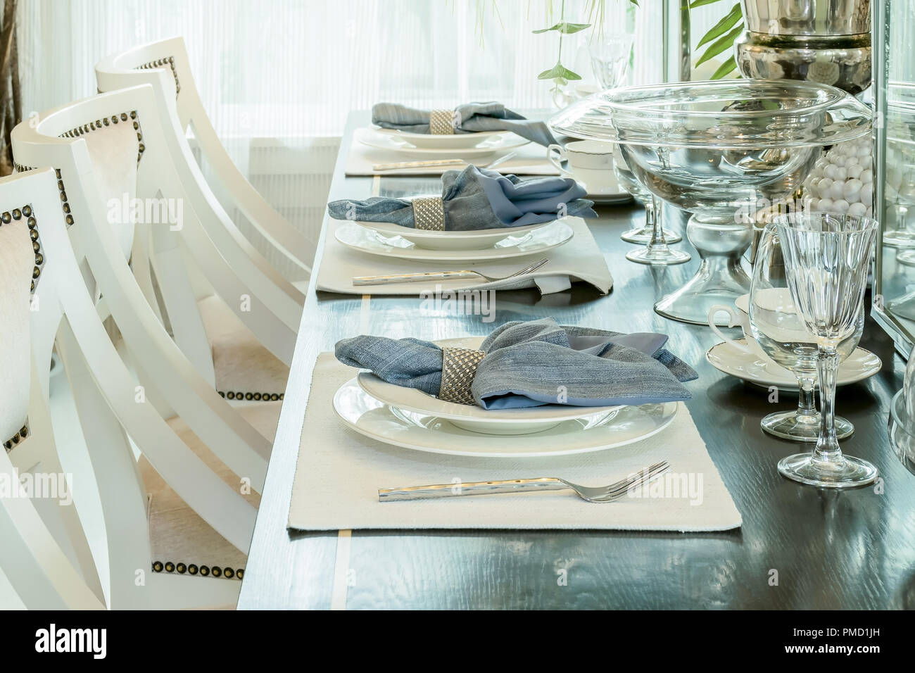 elegant table set in classic style dining room interior Stock Photo - Alamy