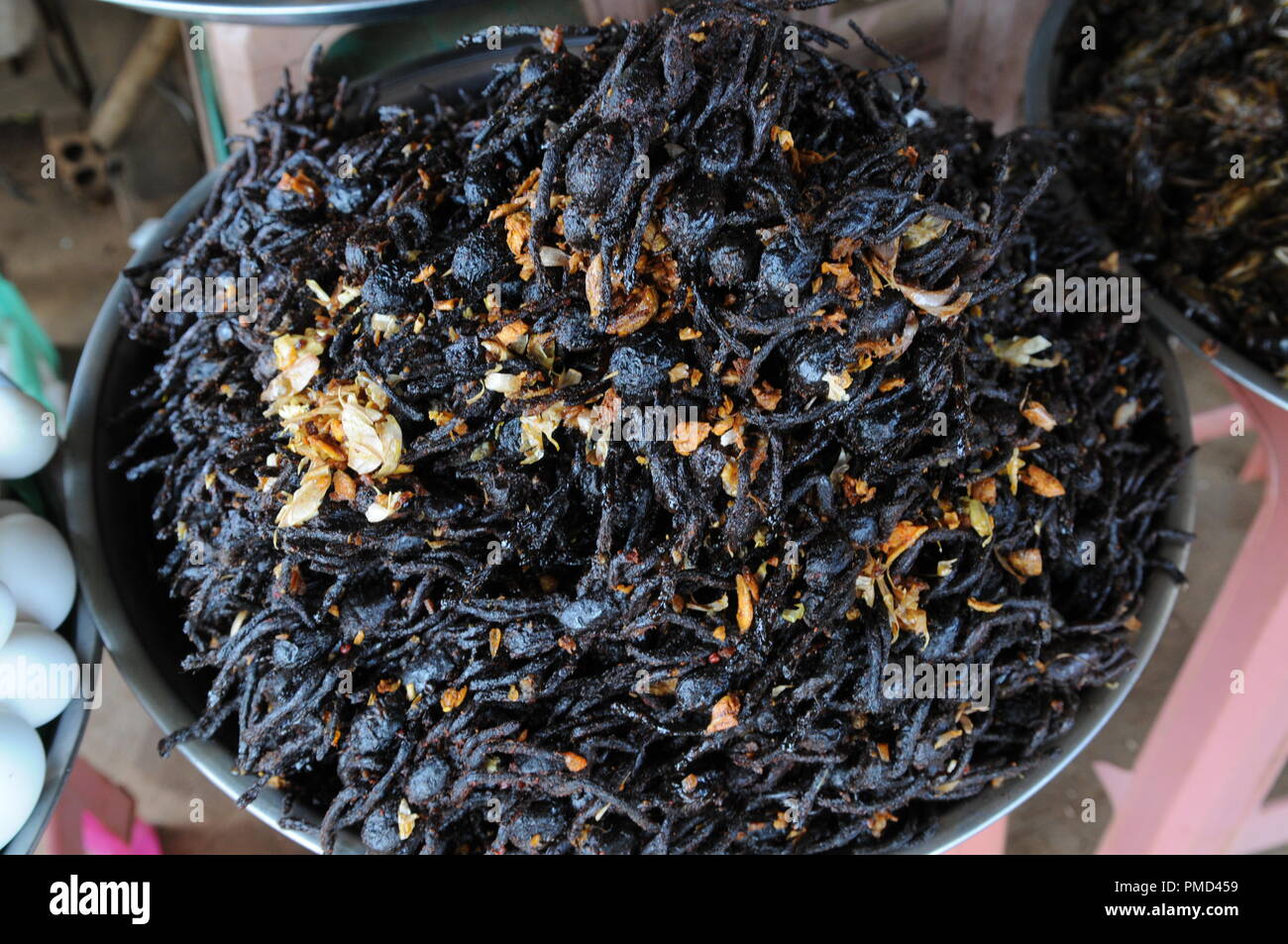 Fried Tarantulas at an open air market, fried spider is a regional ...