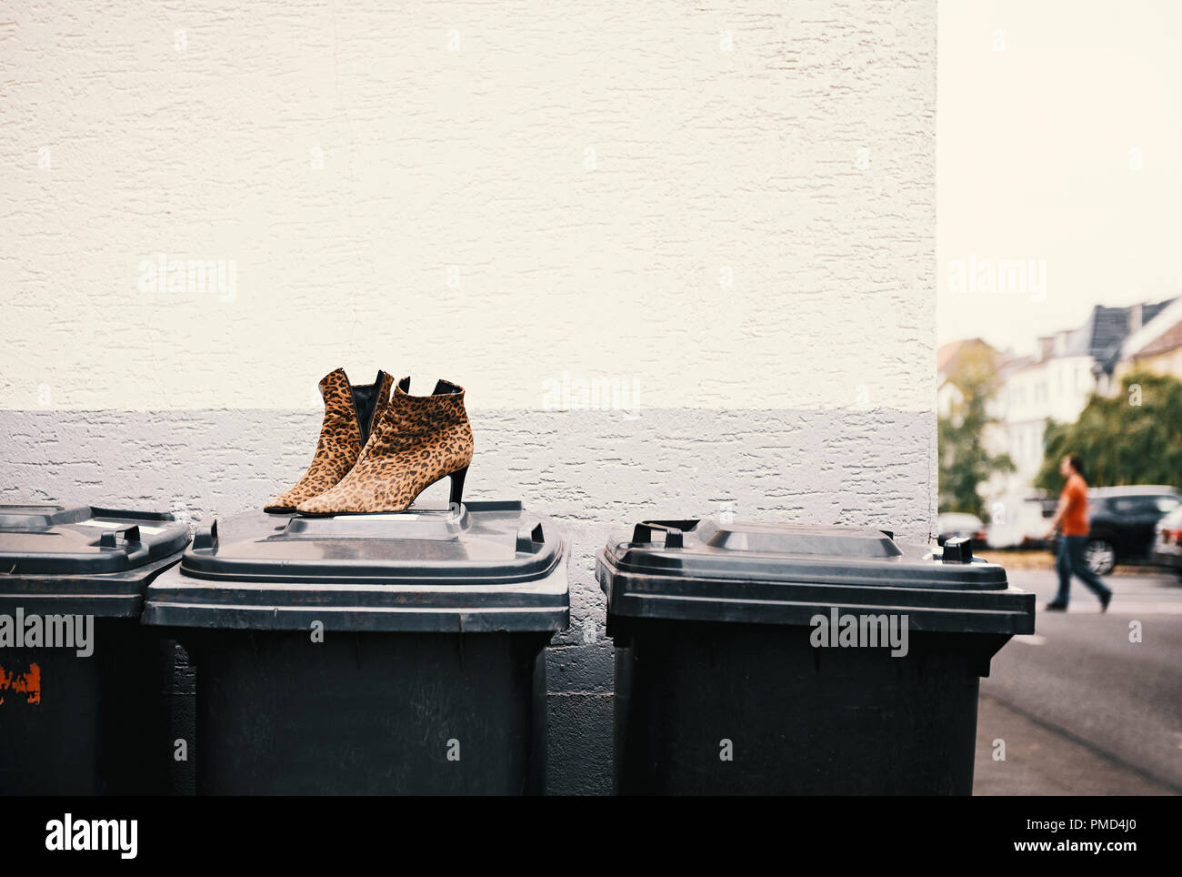 High heels with tiger pattern in urban surrounding Stock Photo - Alamy