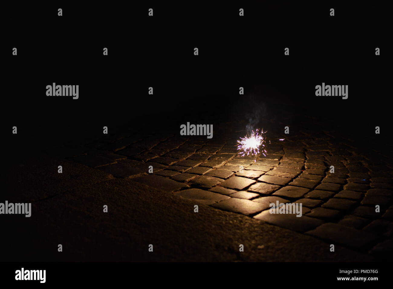 Bengali fire on square on the street at night Stock Photo - Alamy