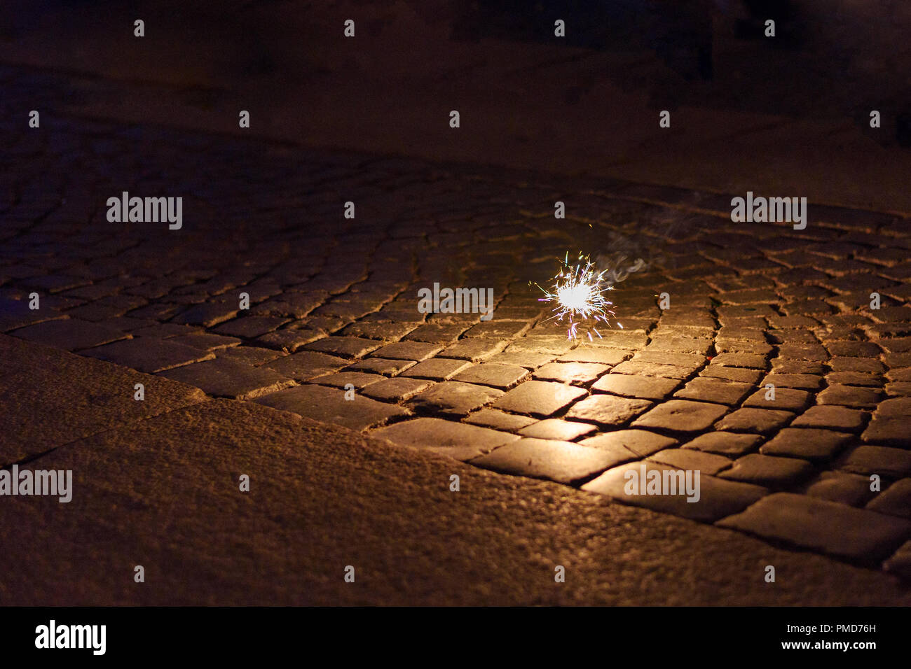 Bengali fire on square on the street at night Stock Photo - Alamy