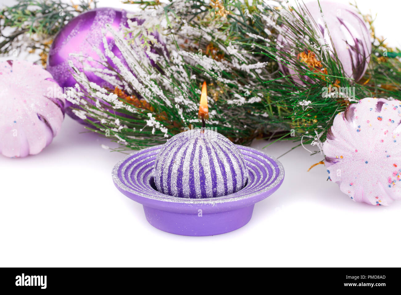 Christmas pink balls, candle and fir tree on white background Stock ...