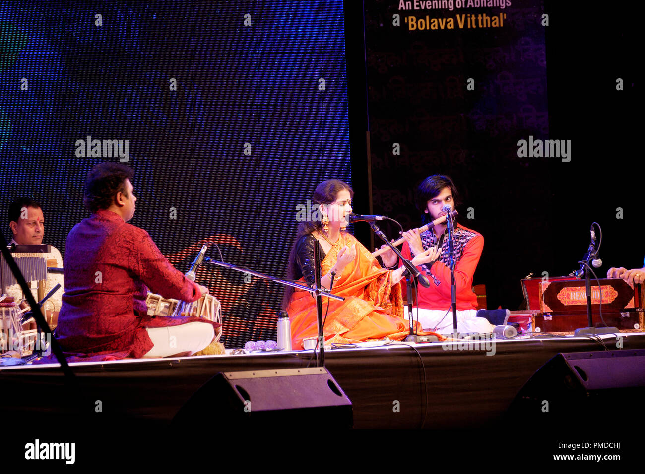 Singing bhajans hi-res stock photography and images - Alamy