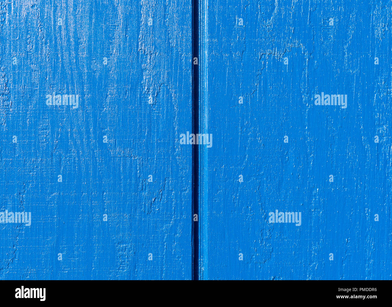 Close view of grooved plywood painted a very bright blue Stock Photo ...