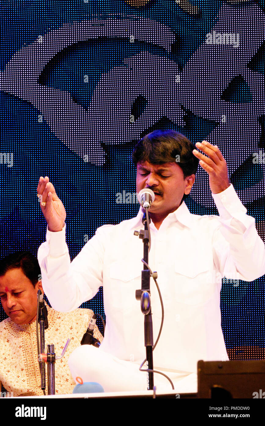 Singing bhajans hi-res stock photography and images - Alamy
