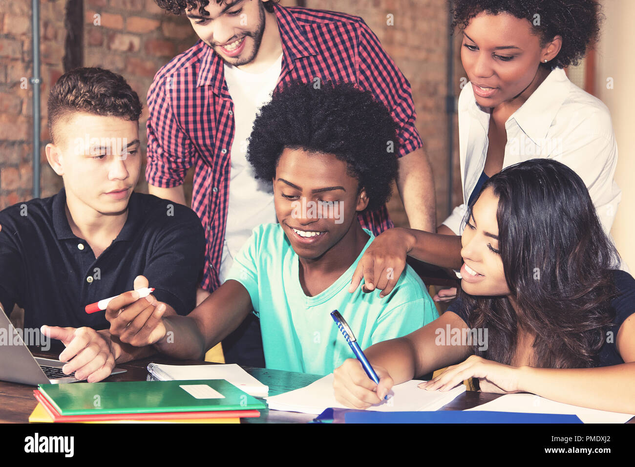 Group of american students learning at university for exam Stock Photo ...