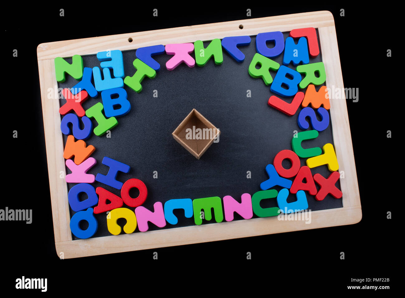 paper box and Colorful wooden Letters of Alphabet Stock Photo - Alamy