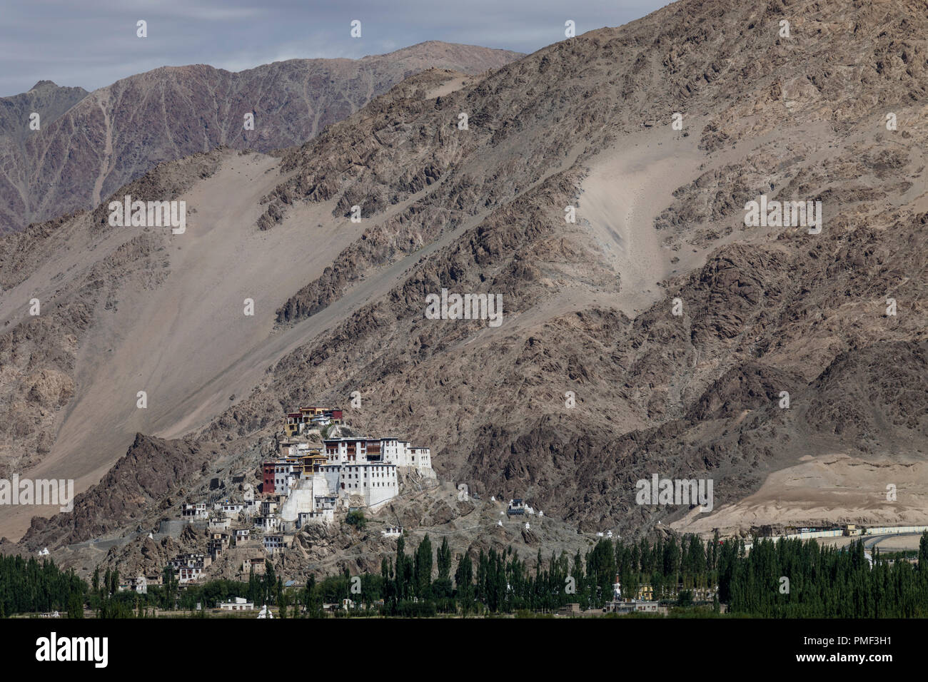 View of the Spituk monastery against backdrop of mountains in Ladakh ...