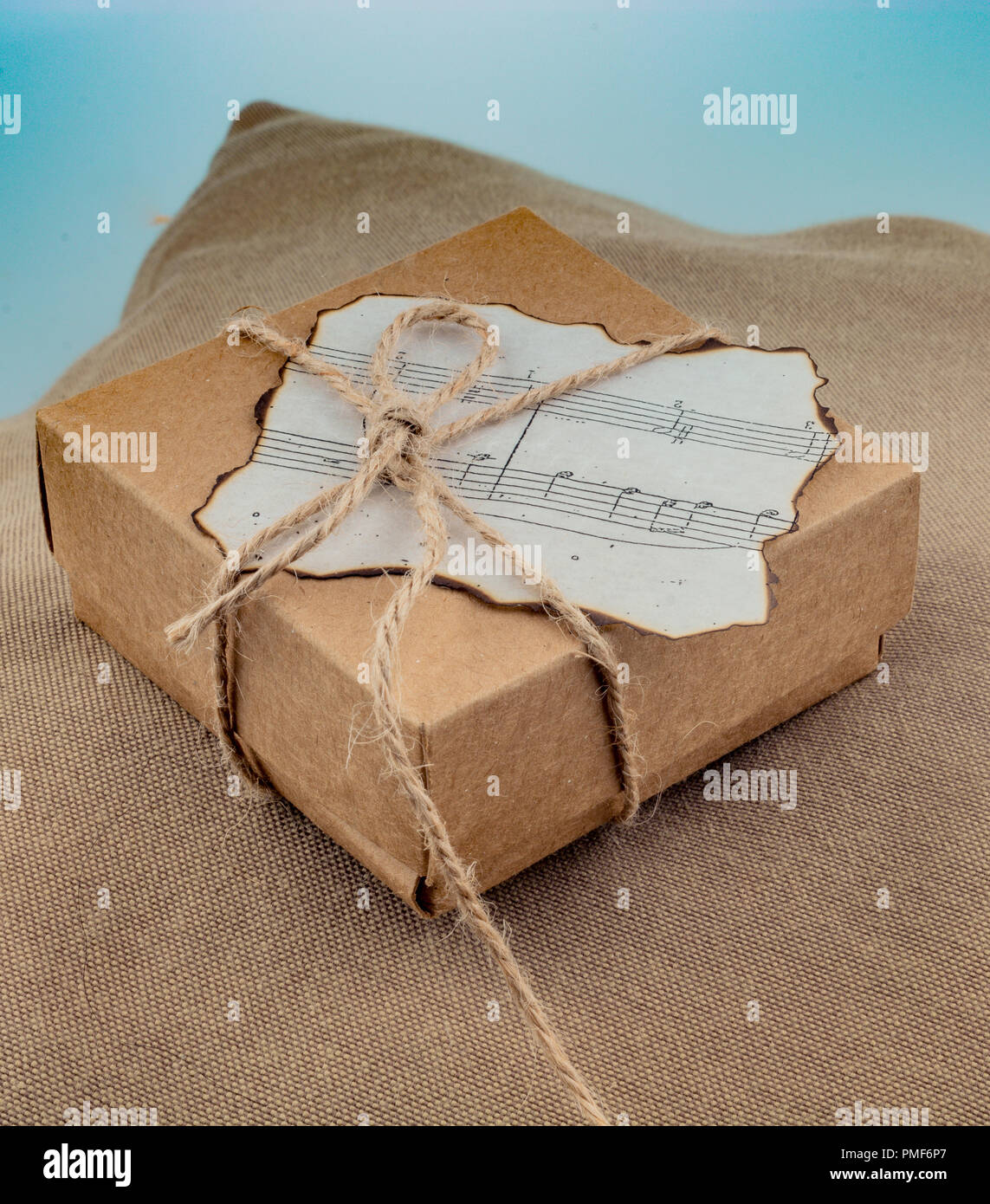 Musical notes on a burnt paper on a brown background Stock Photo - Alamy