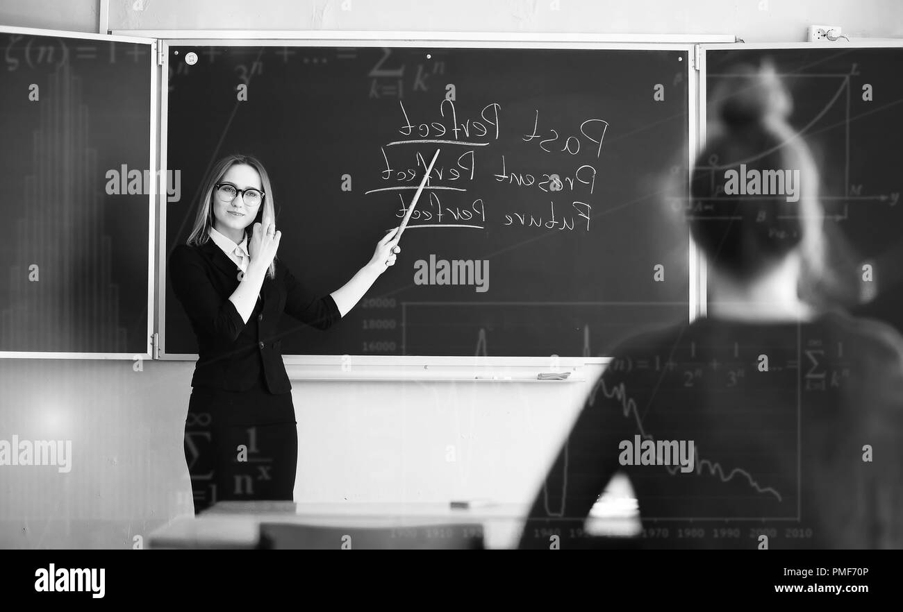 Background with math symbols and teacher in primary school Stock Photo ...