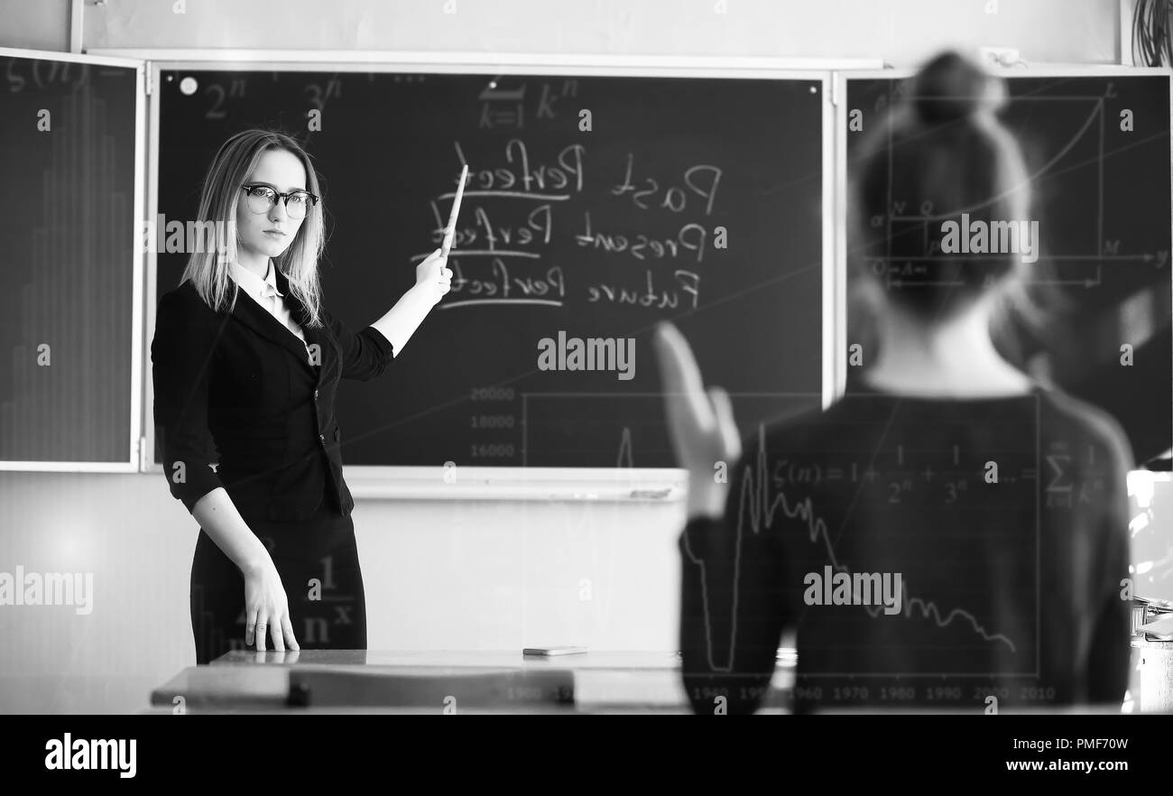 Background with math symbols and teacher in primary school Stock Photo ...