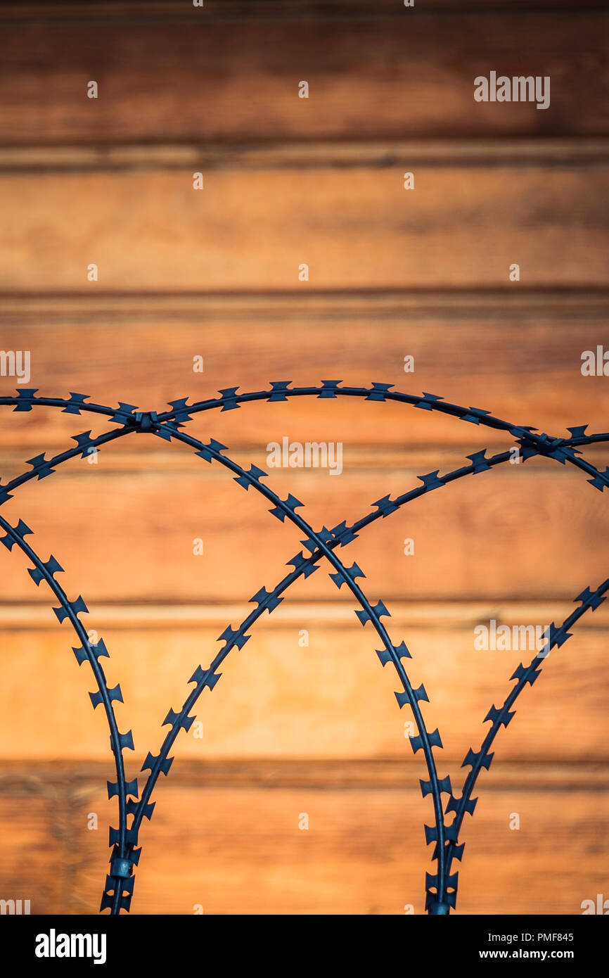 barbed wire fence used for protection purposes of a pproperty Stock ...