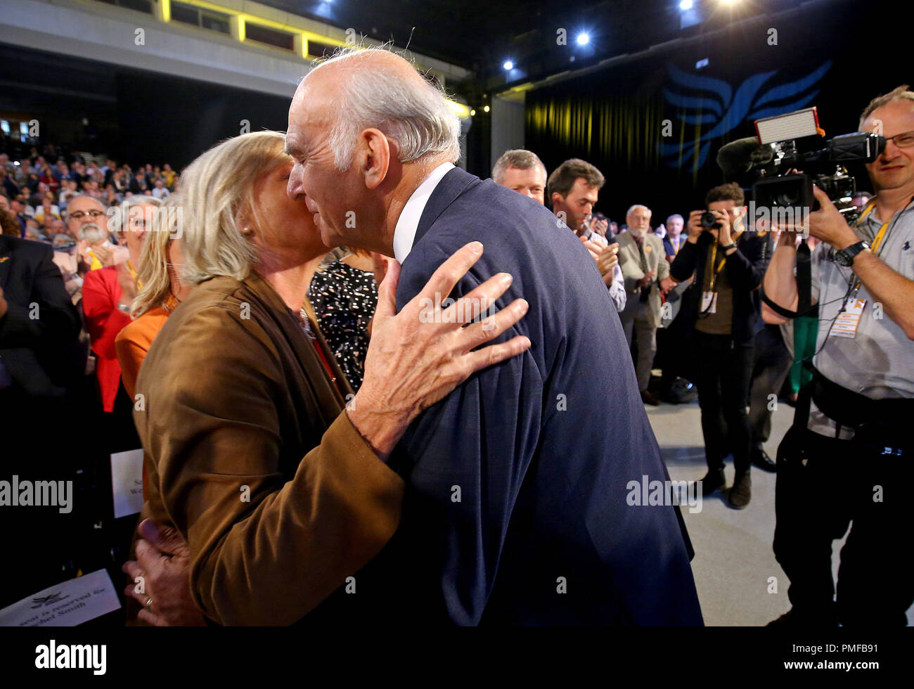 Liberal Democrats Leader Sir Vince Cable is congratulated by his wife ...