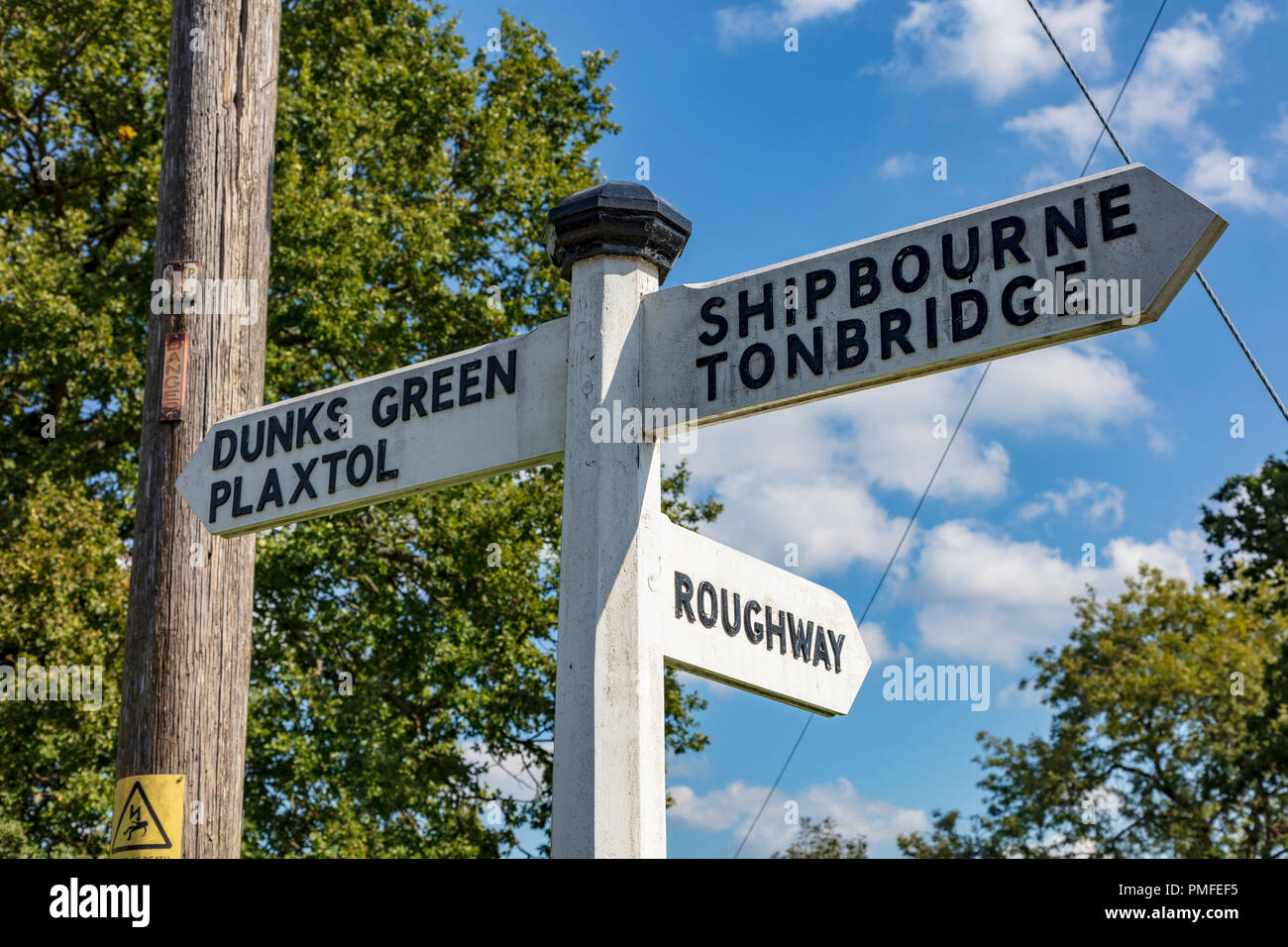 A traditional Finger Post made from wood at Dunks Green, Kent, UK ...