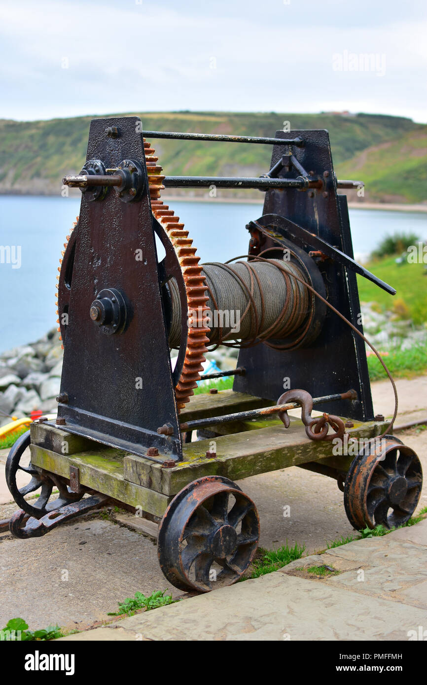 The old winch for lifting boats at the harbour of Runswick Bay,North ...