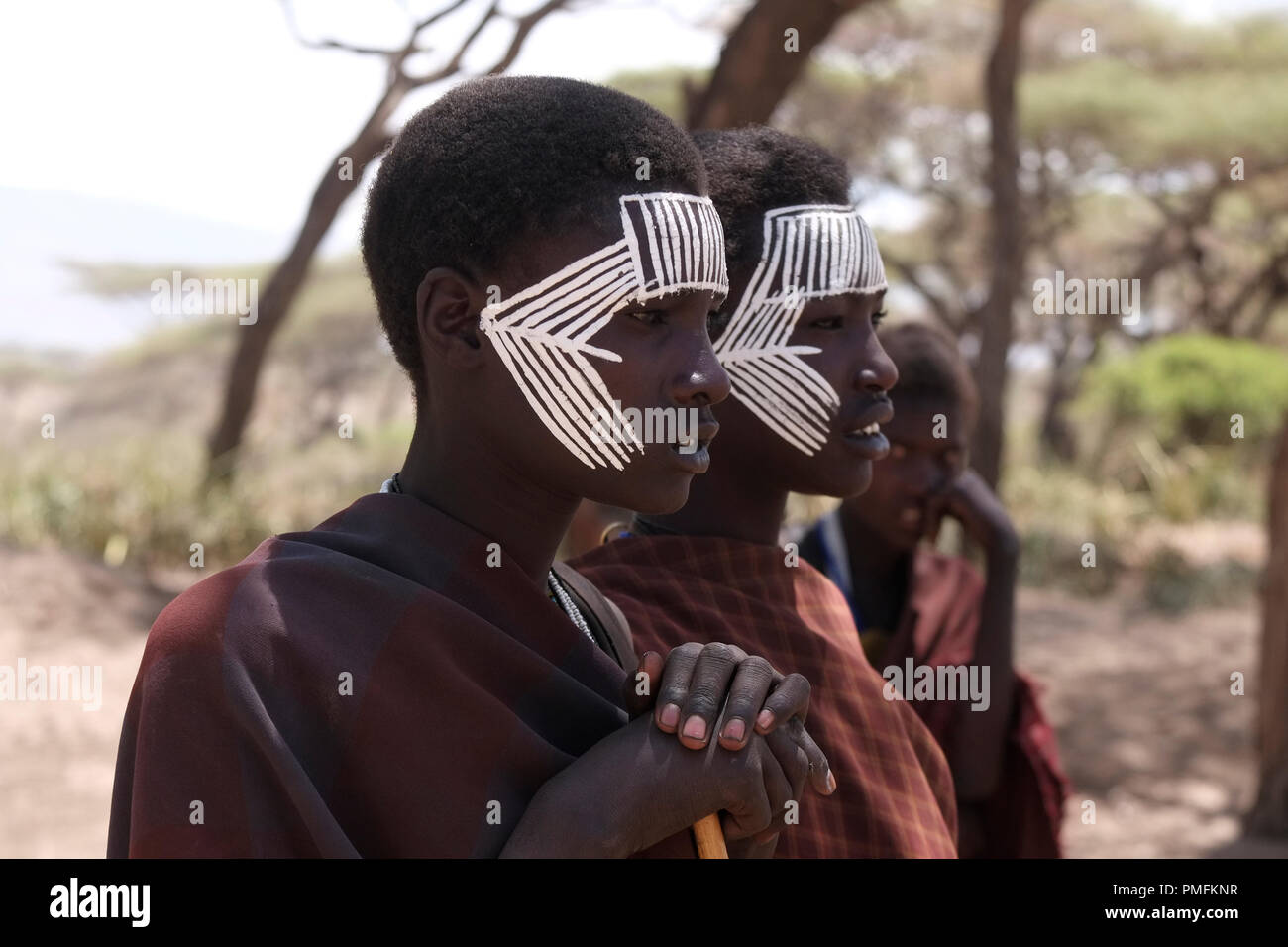 Young Maasai Moran warriors with face markings in the Ngorongoro ...