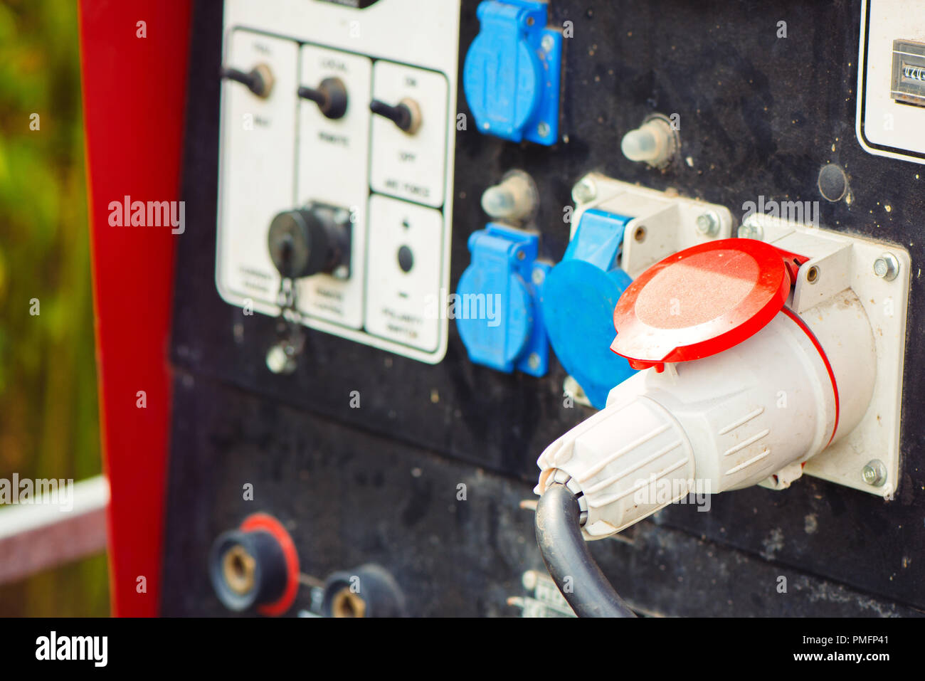Electric power aggregate generator in industrial hemp field Stock Photo ...