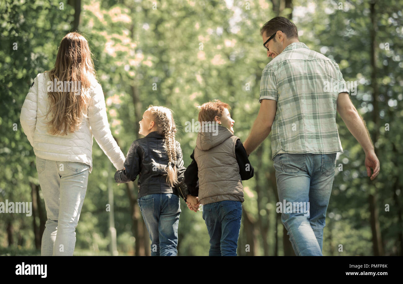 children and parents on a walk in the Park.t Stock Photo - Alamy