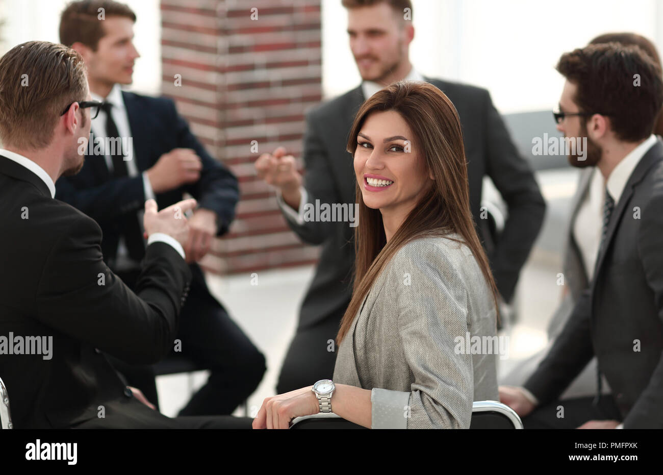 Group employees discussing something hi-res stock photography and ...