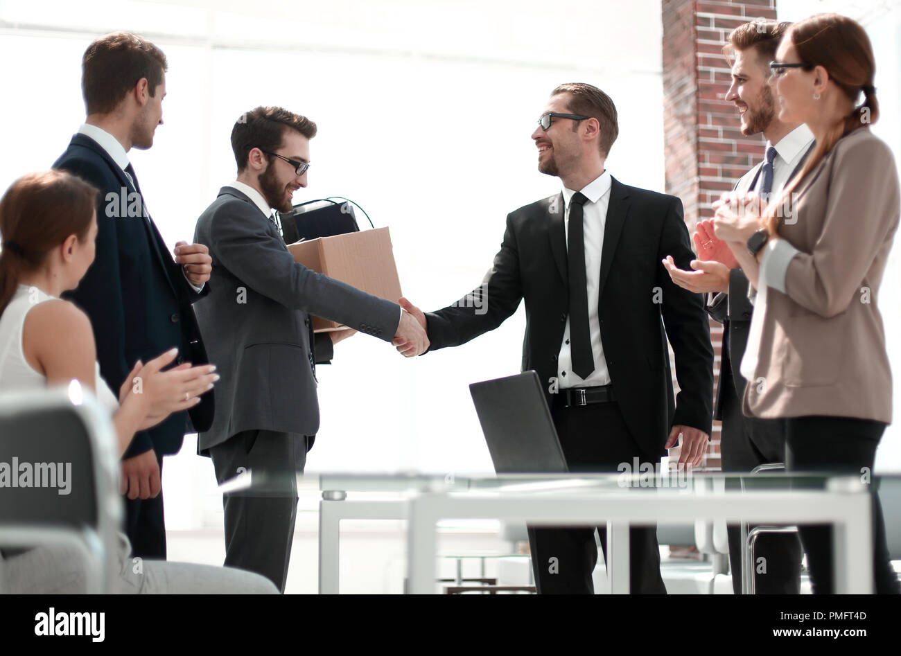 Employer And Employee Shaking Hands