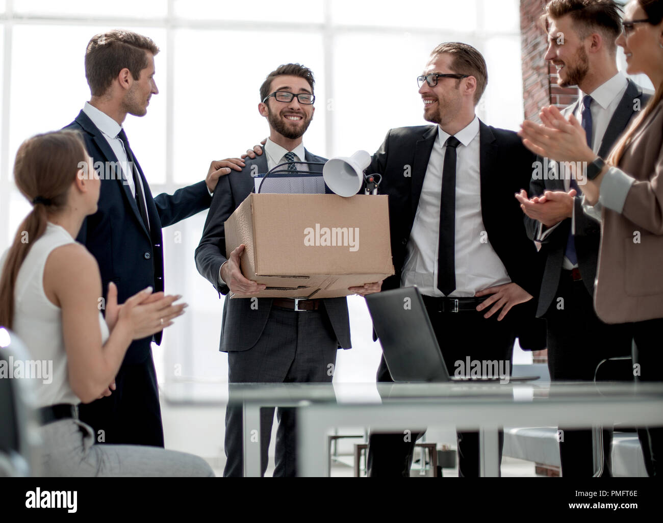 business team congratulating a new employee with a raise Stock Photo ...