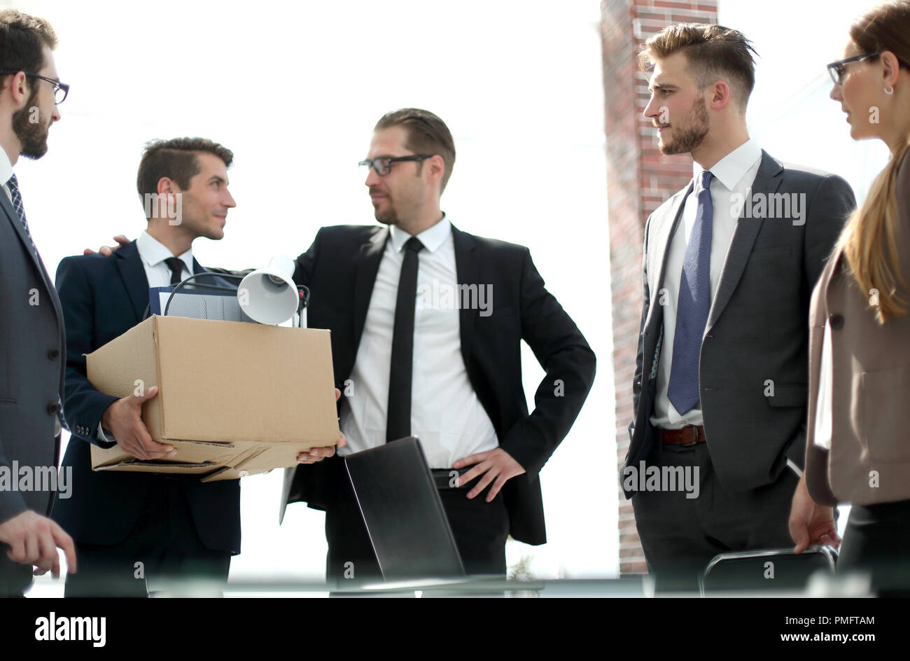business group welcoming new employee Stock Photo - Alamy