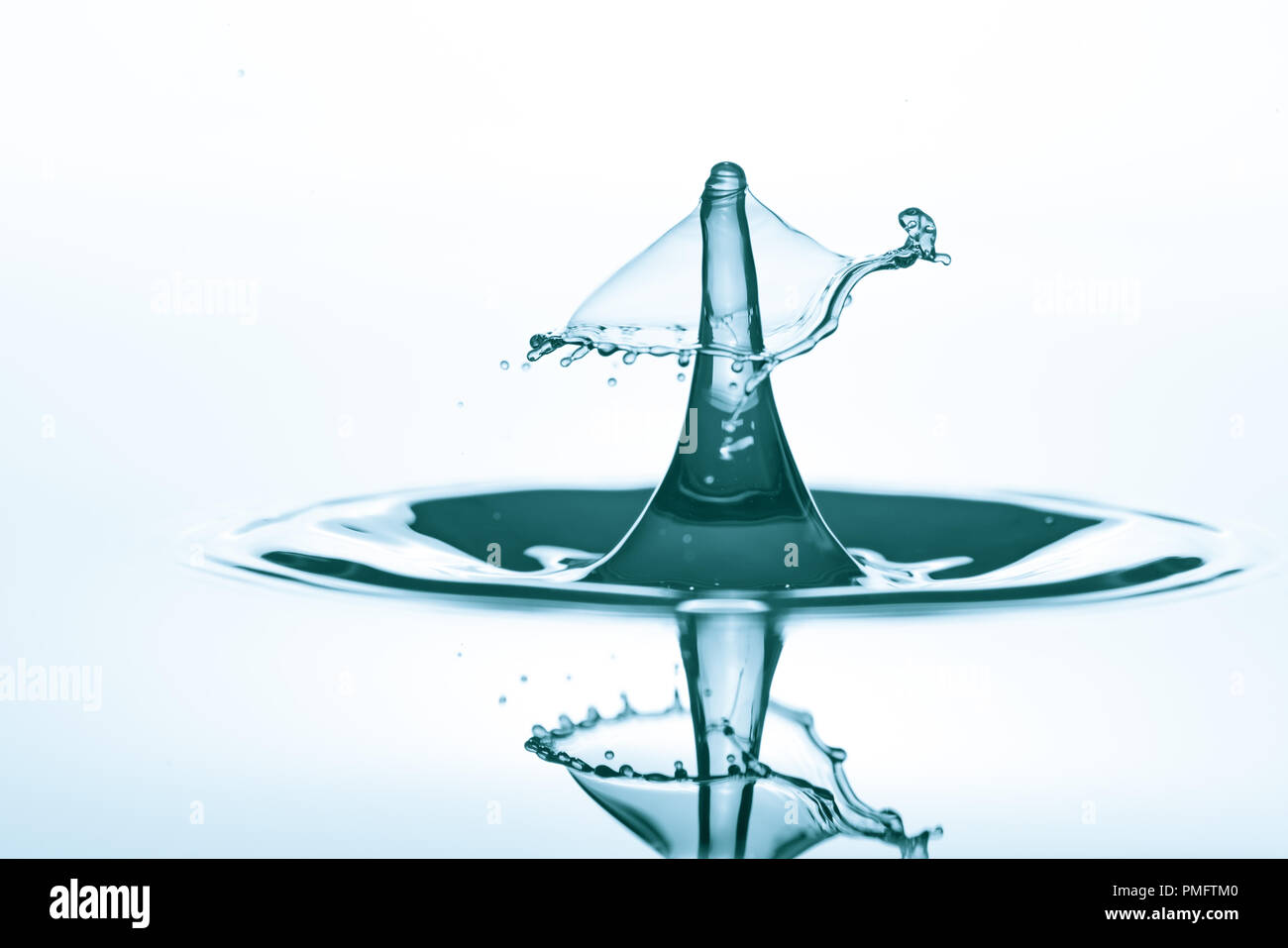 Collision of falling water droplets Stock Photo - Alamy