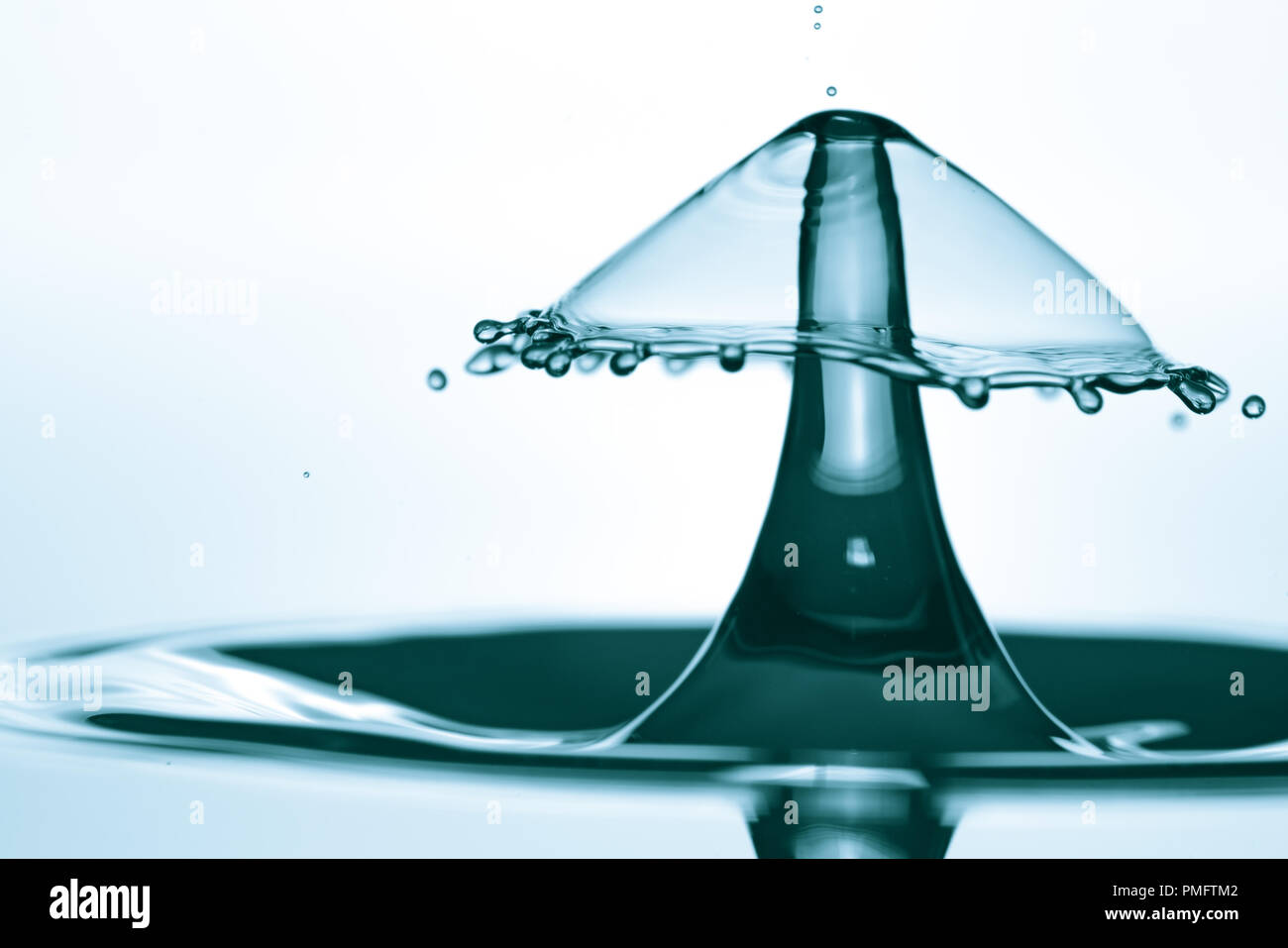 splash of the falling drops of water, collision drops Stock Photo - Alamy