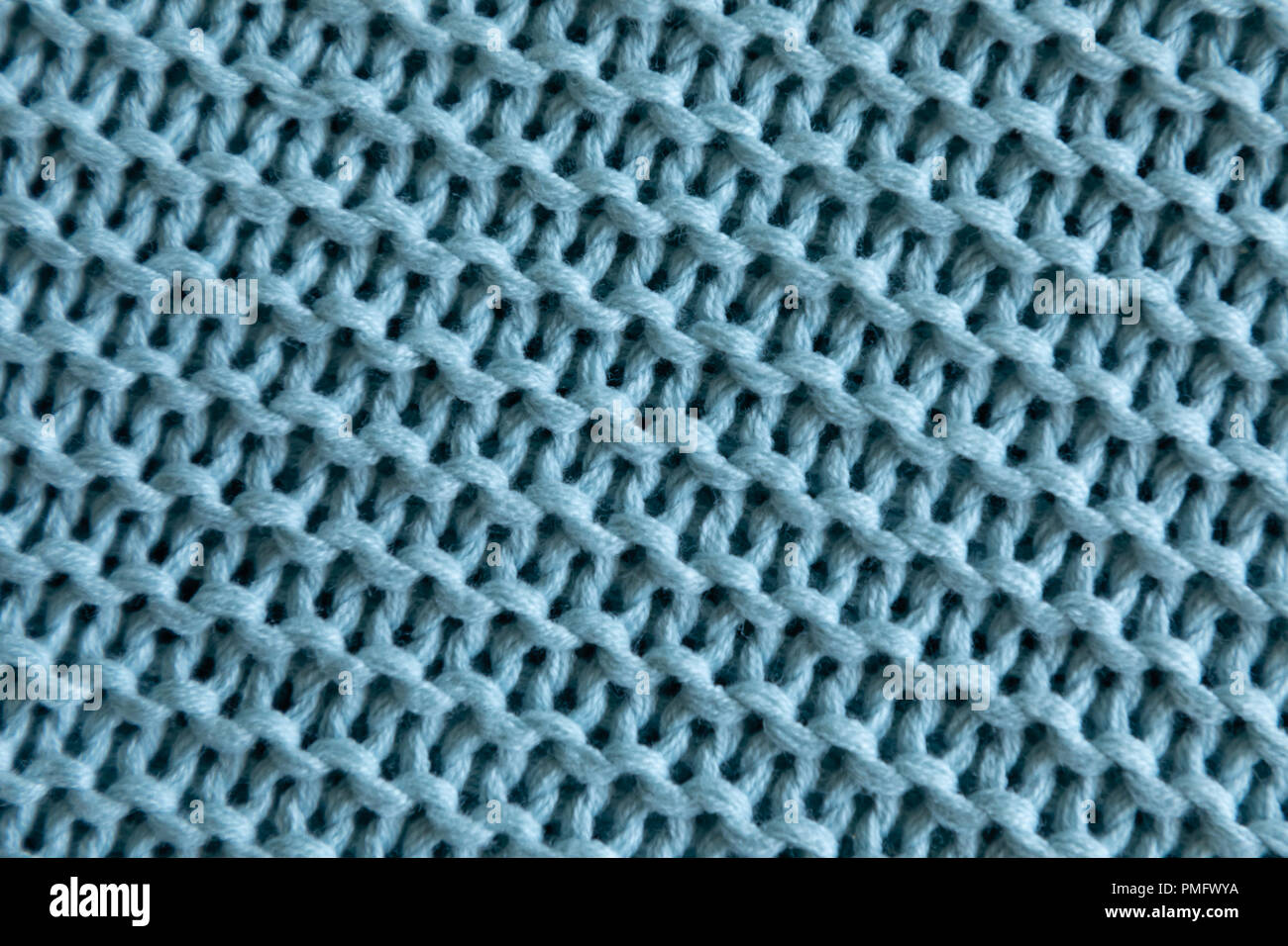 Handmade blue knitting wool texture background Stock Photo - Alamy