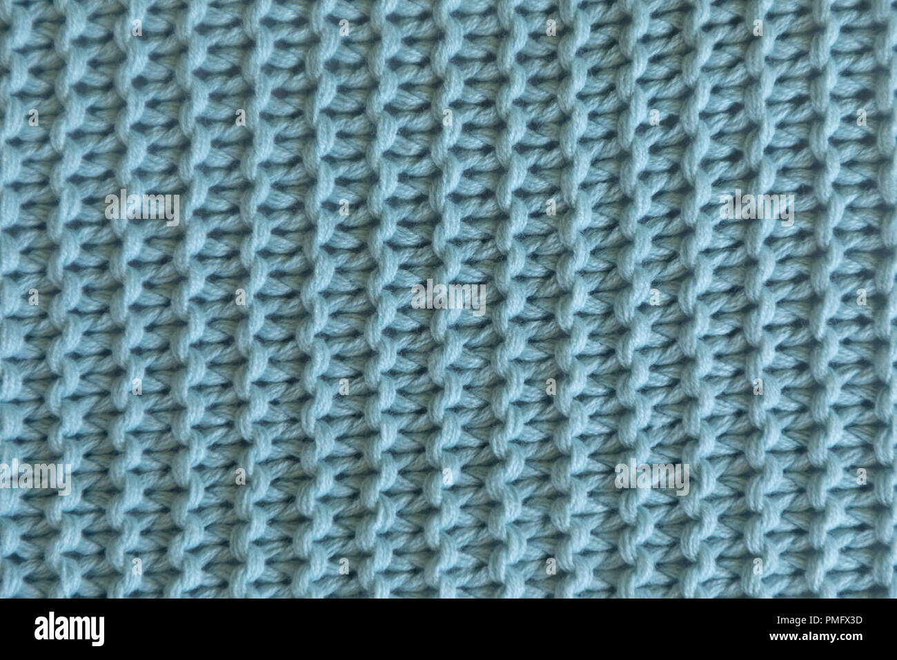 Handmade blue knitting wool texture background Stock Photo - Alamy