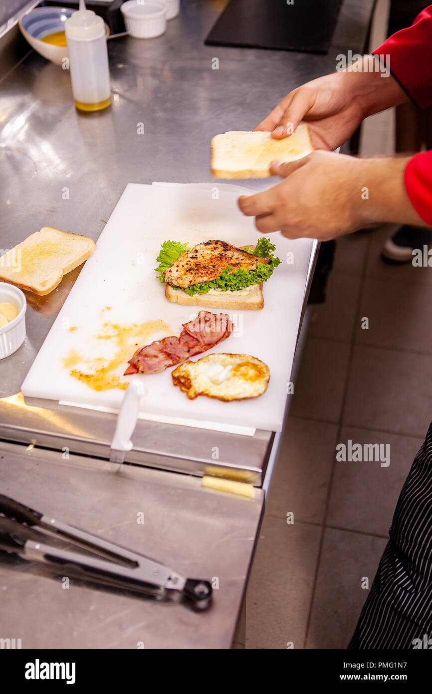Chef making sandwich with fresh ingredient.Delicious nutrition Stock ...