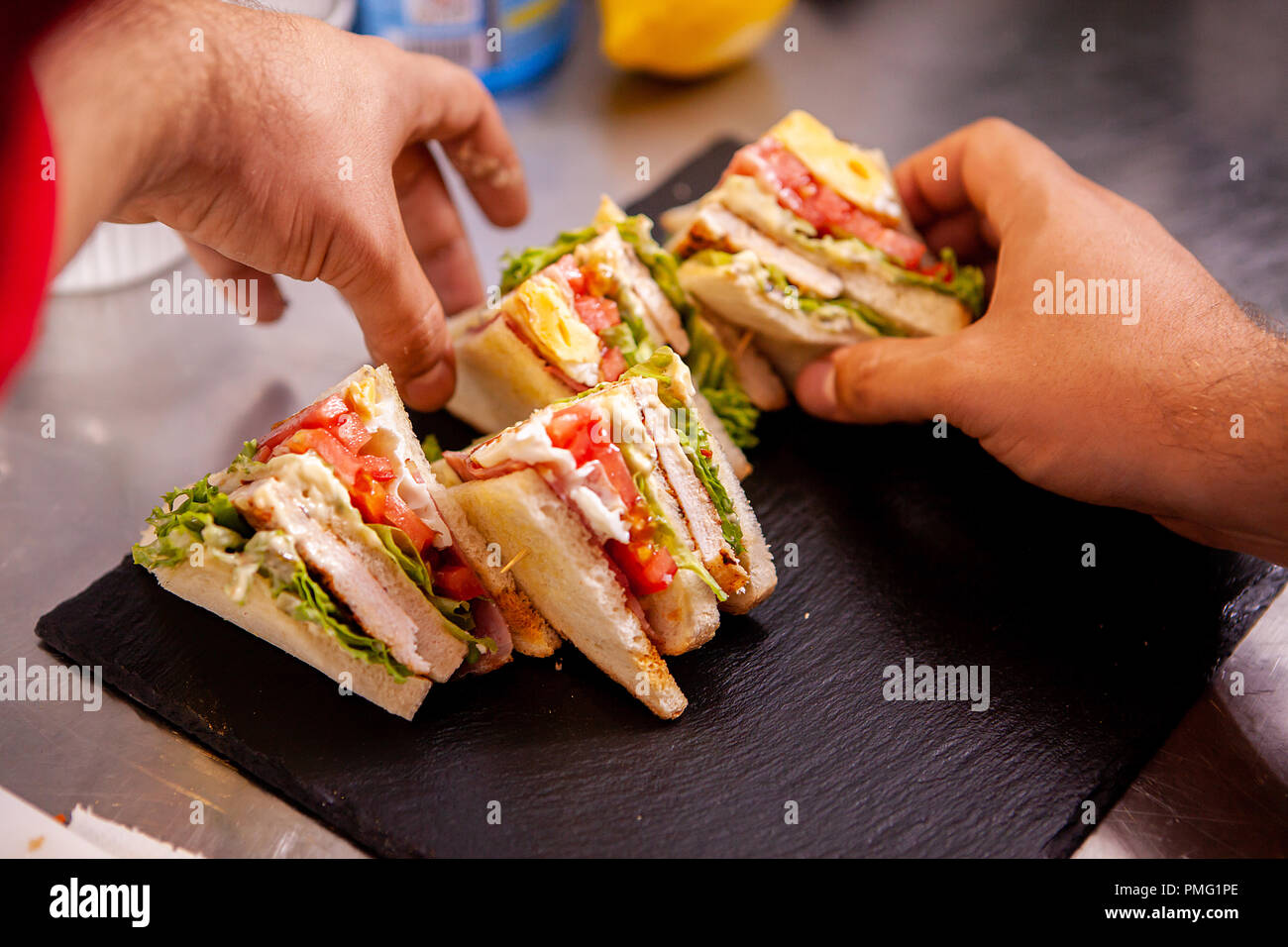 Chef making sandwich desing on stone plate. Restaurant cuisine Stock ...