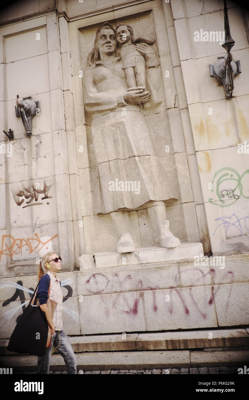 Warsaw Poland Social Realism style statue figures adjacent to Plac ...
