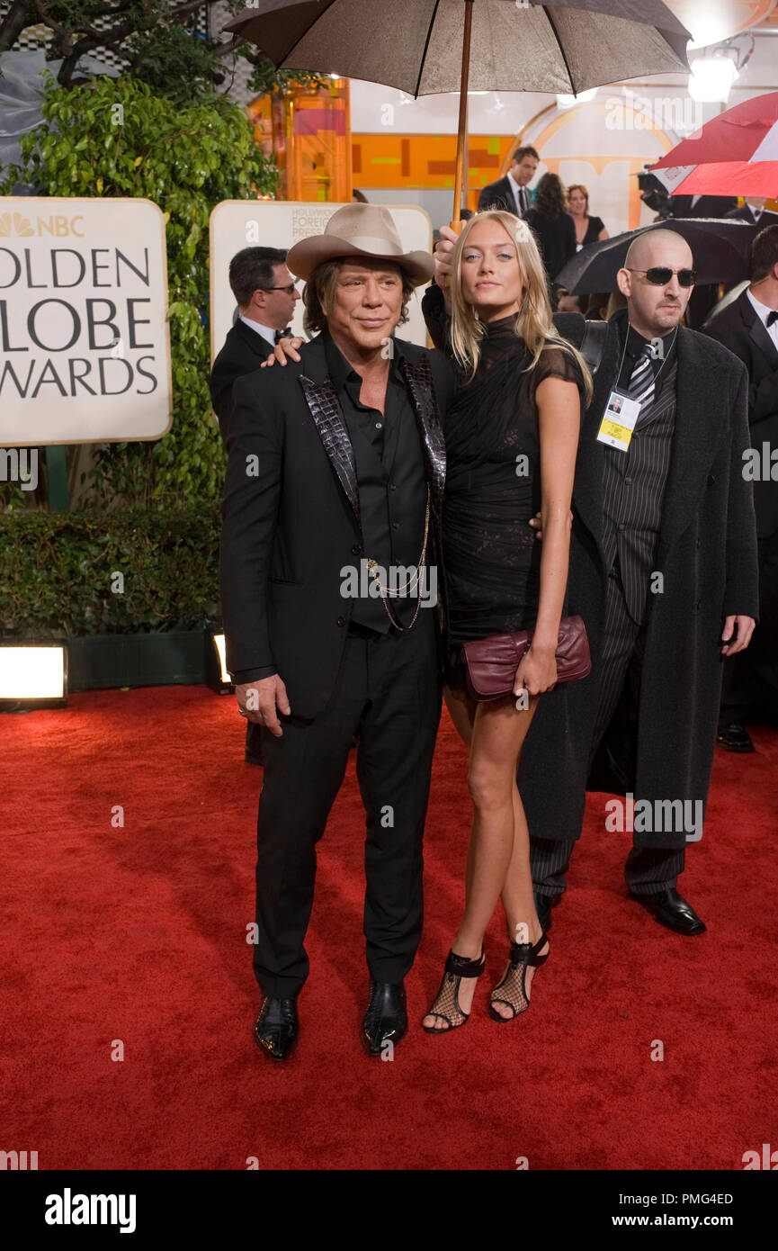 Actor Mickey Rourke and guest arrive at the 67th Annual Golden Globe Awards at the Beverly ...