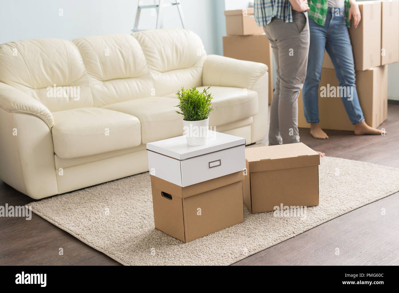 Cardboard moving boxes in empty room, relocation and moving concept ...