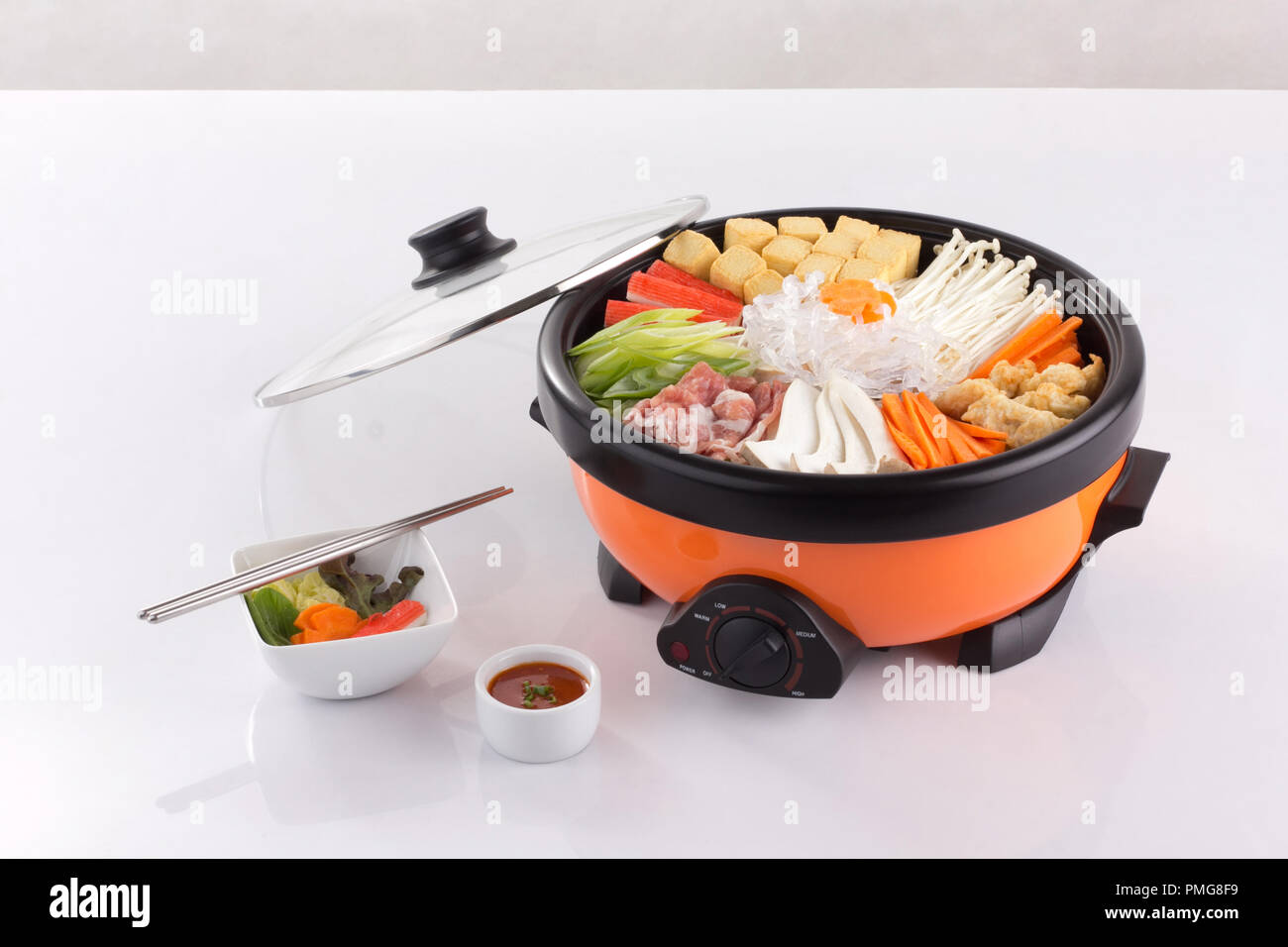 Sukiyaki pot with vegetable and pork isolated on white background Stock ...