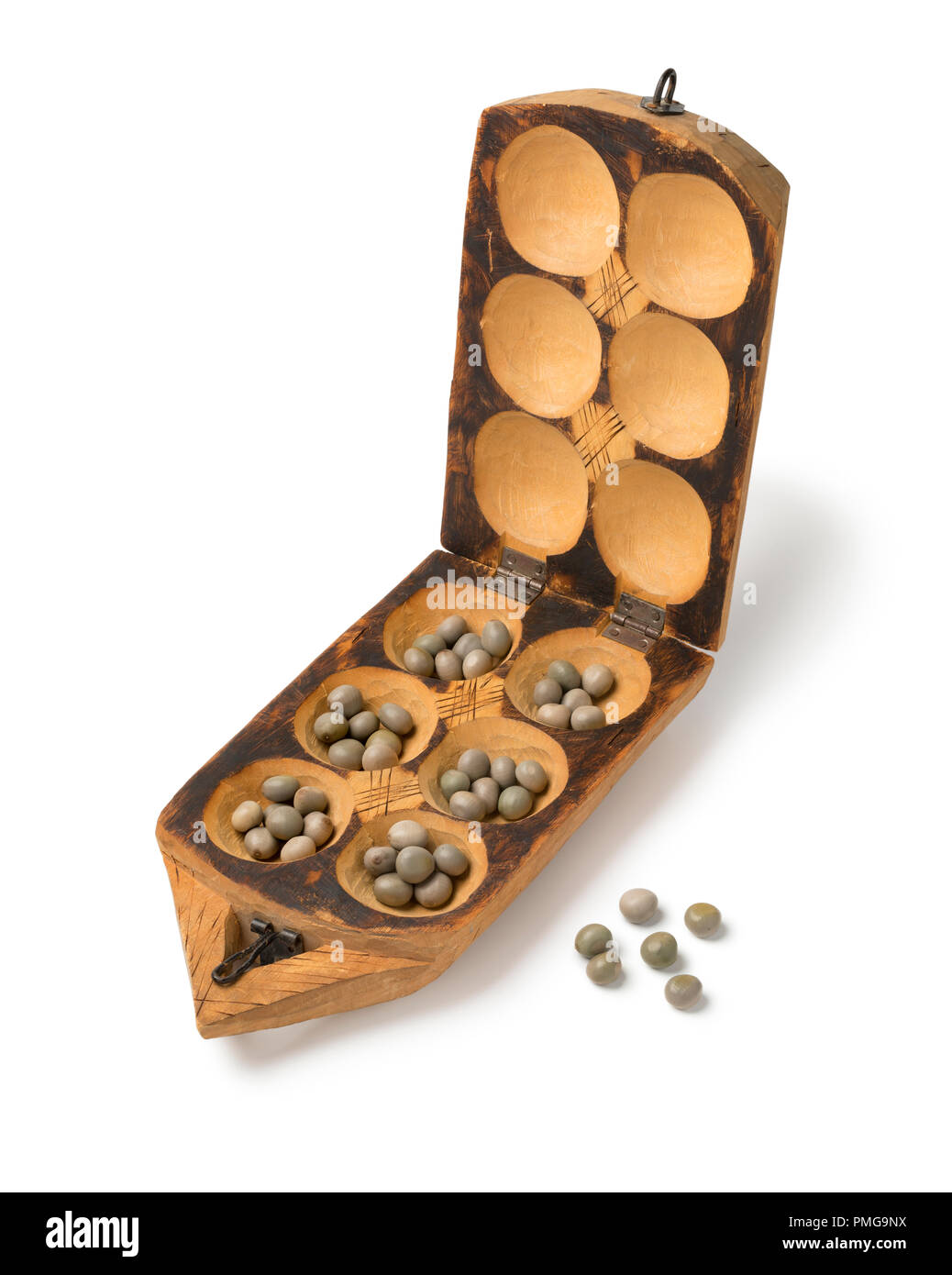 Traditional African oware game with seeds isolated on white background ...