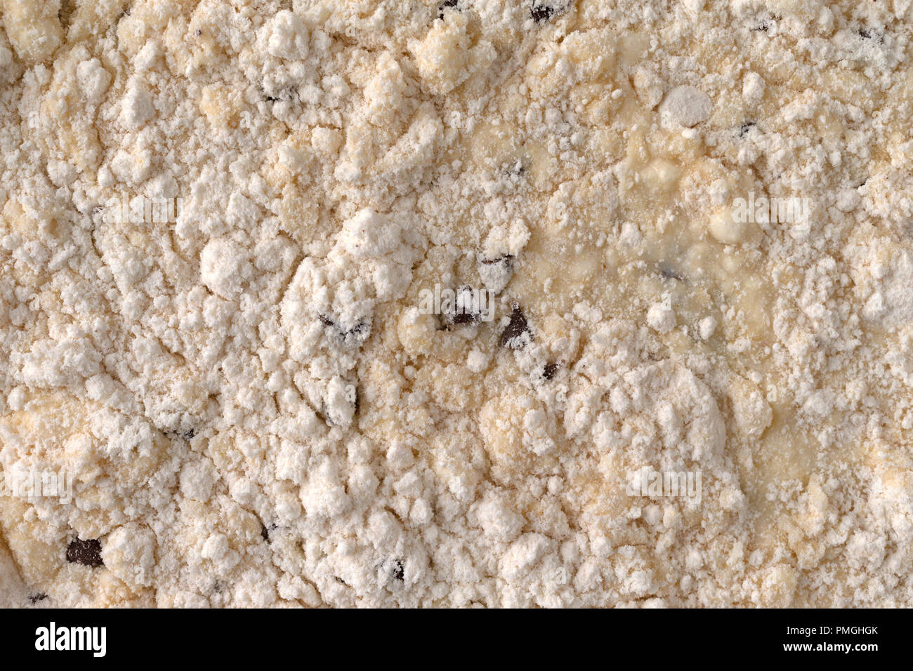 Top view of clumpy chocolate chip muffin mix with milk added Stock ...