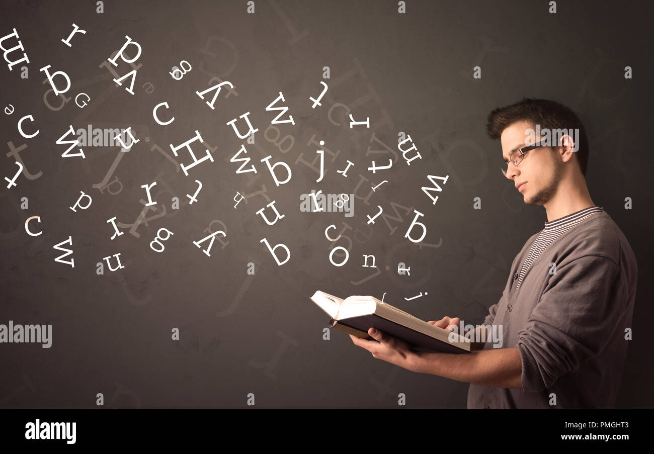 Open book flying alphabet hi-res stock photography and images - Alamy