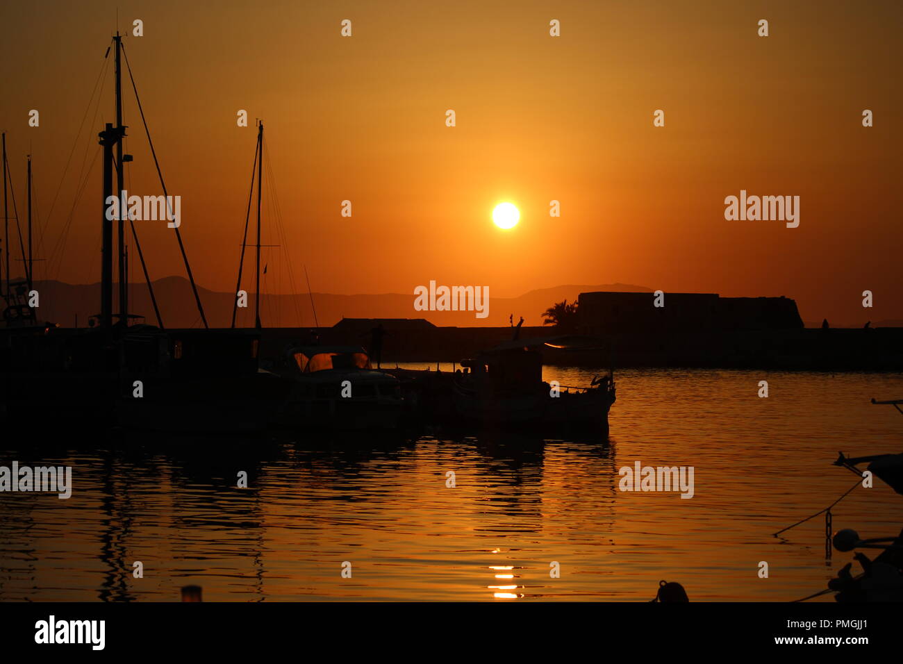 Sunset over Venetian Harbour, Chania, Crete, Greece Stock Photo - Alamy
