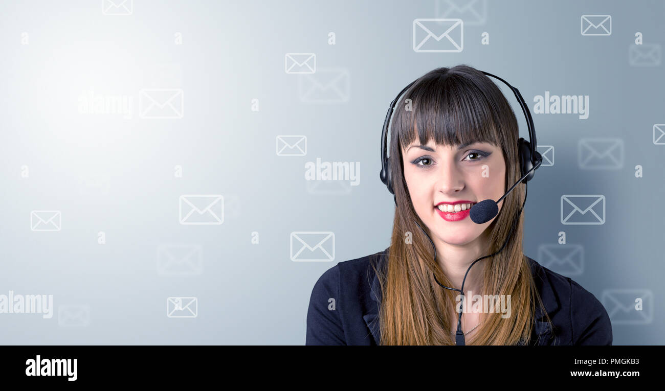 Young female telemarketer with white envelopes surrounding her Stock ...