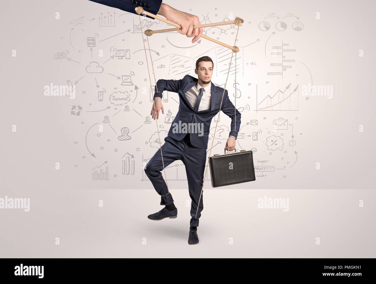 Little businessman controlled from above like a puppet concept Stock ...