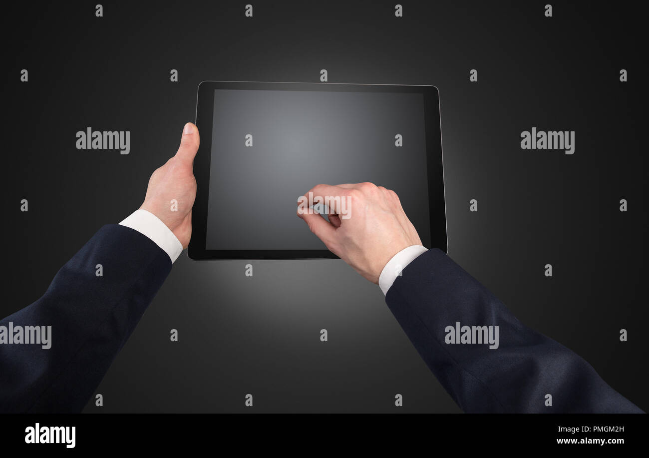 Hand using tablet with no concept and empty space Stock Photo - Alamy