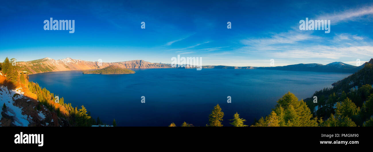 Panoramic view of Crater Lake in the early morning light devoid of ...